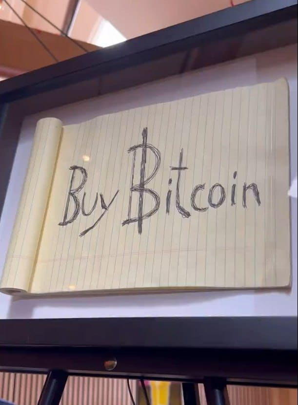 A notepad with the famous "buy Bitcoin" inscription sold at | T3ch-no ...