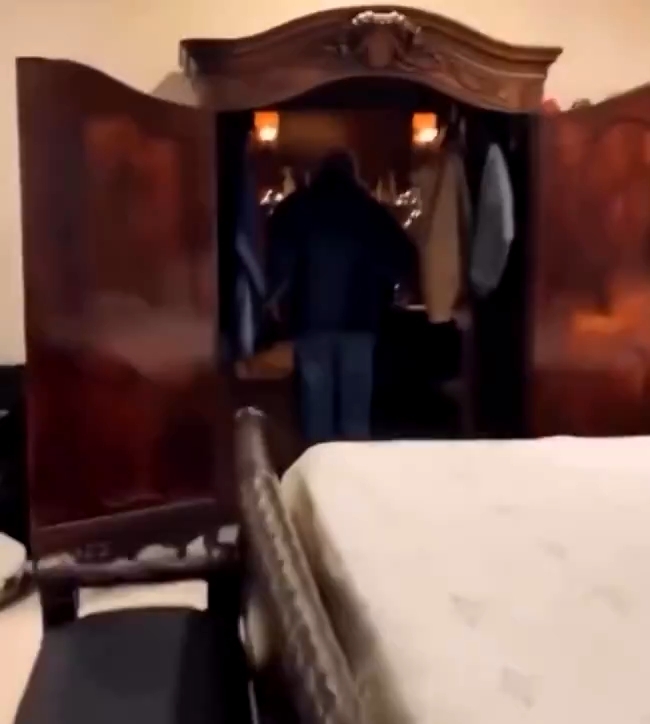 This grandfather's Narnia-inspired library, hidden behind a wardrobe ...